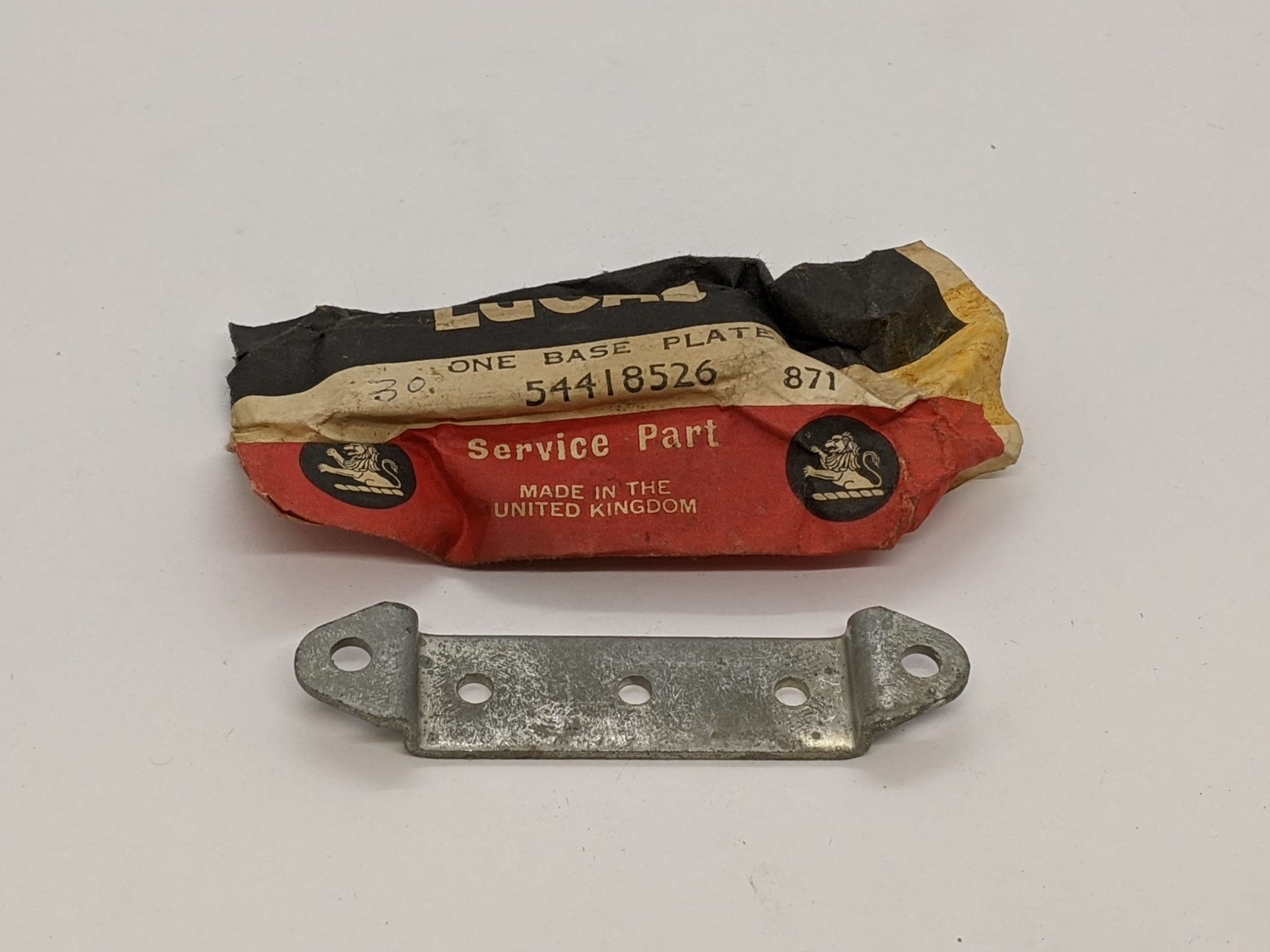 54418526NOS Condenser Base Plate, Lucas – Morrie's Place Cycle